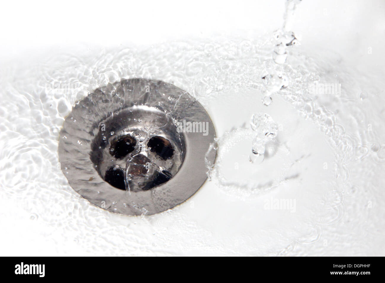Water Wasting in a Bathroom Sink Stock Photo - Alamy