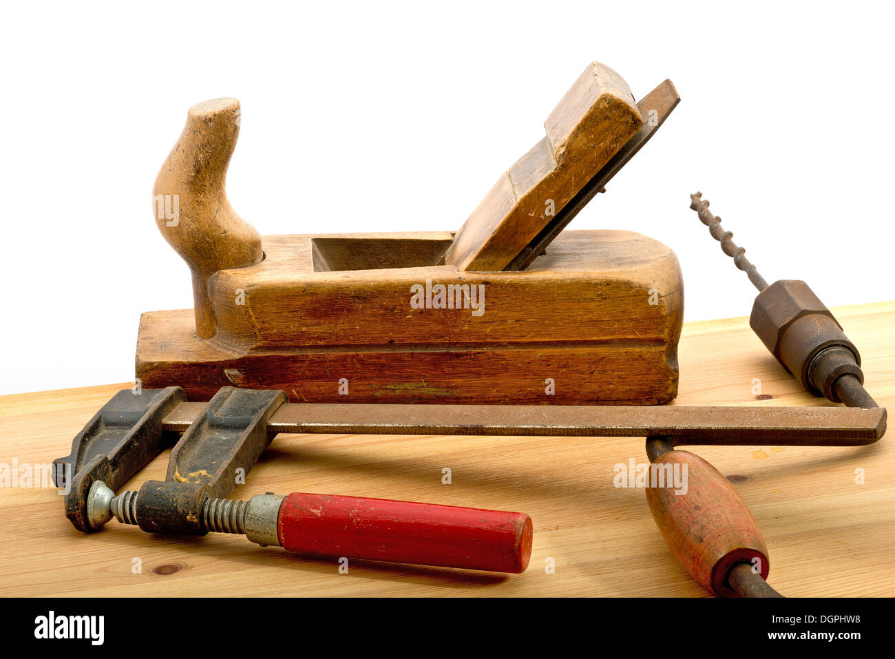 old used tools on the wooden desk Stock Photo - Alamy