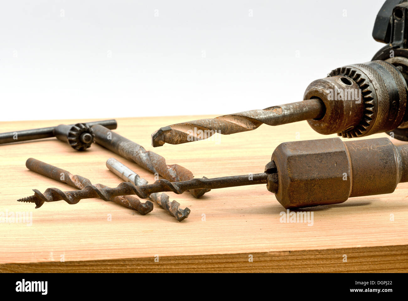 old used tools on the wooden desk Stock Photo - Alamy
