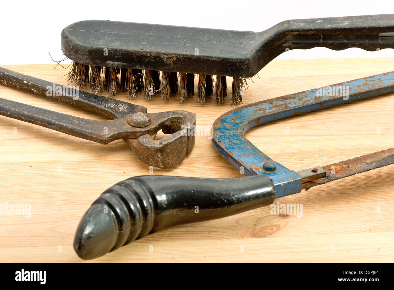 old used tools on the wooden desk Stock Photo - Alamy