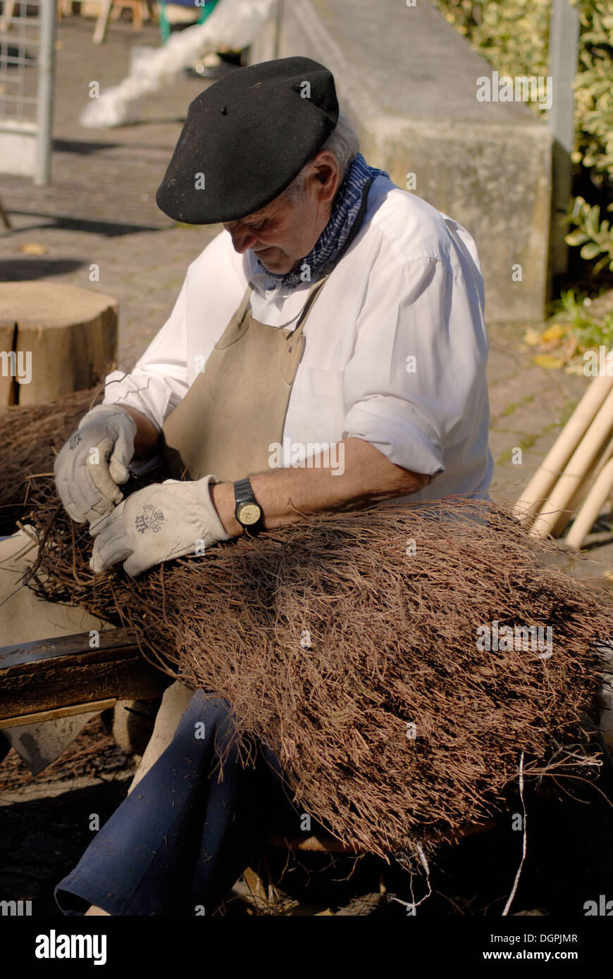 Man with a broom hi-res stock photography and images - Alamy