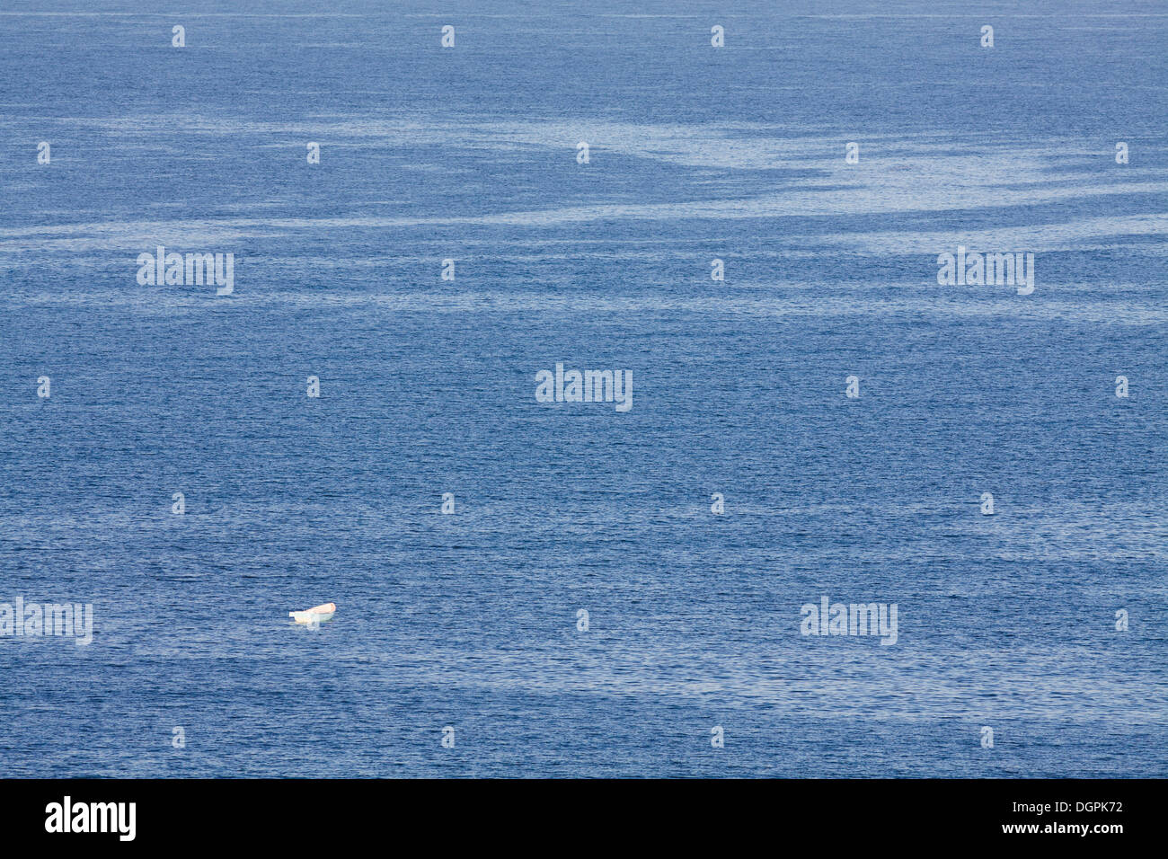 Small boat on Filey Bay, North Yorkshire Stock Photo - Alamy