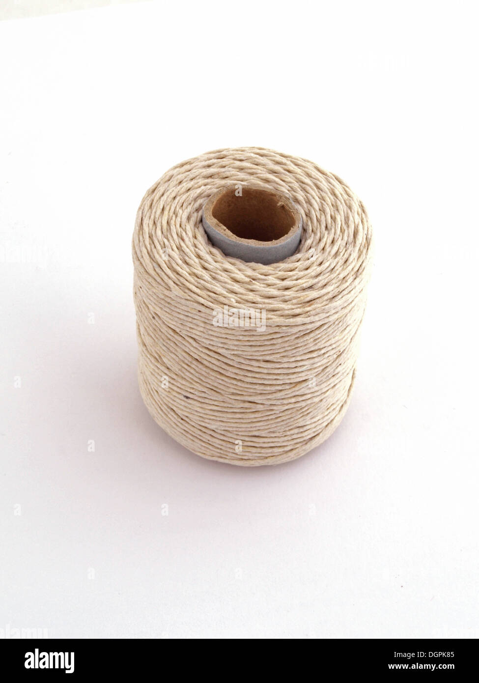 Ball of string or twine on a plain white background Stock Photo - Alamy