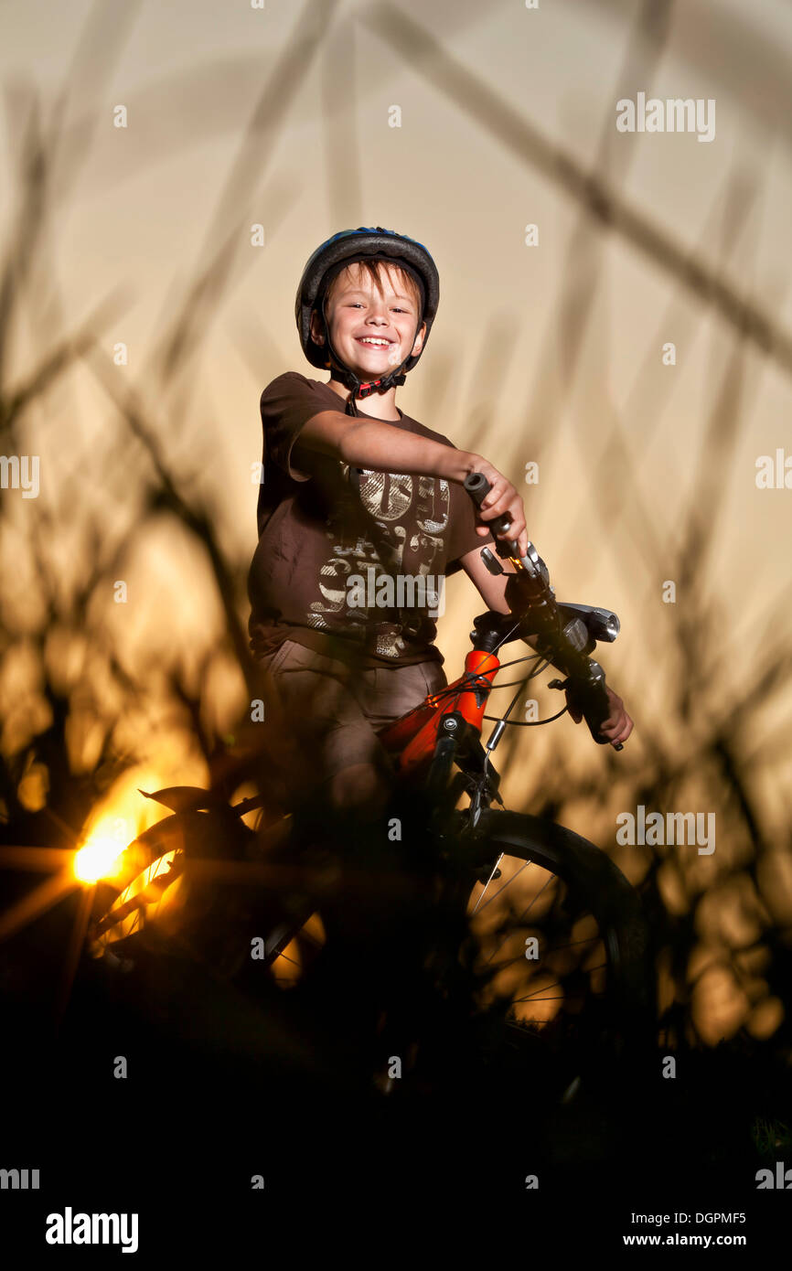 Boy riding a mountain bike Stock Photo - Alamy