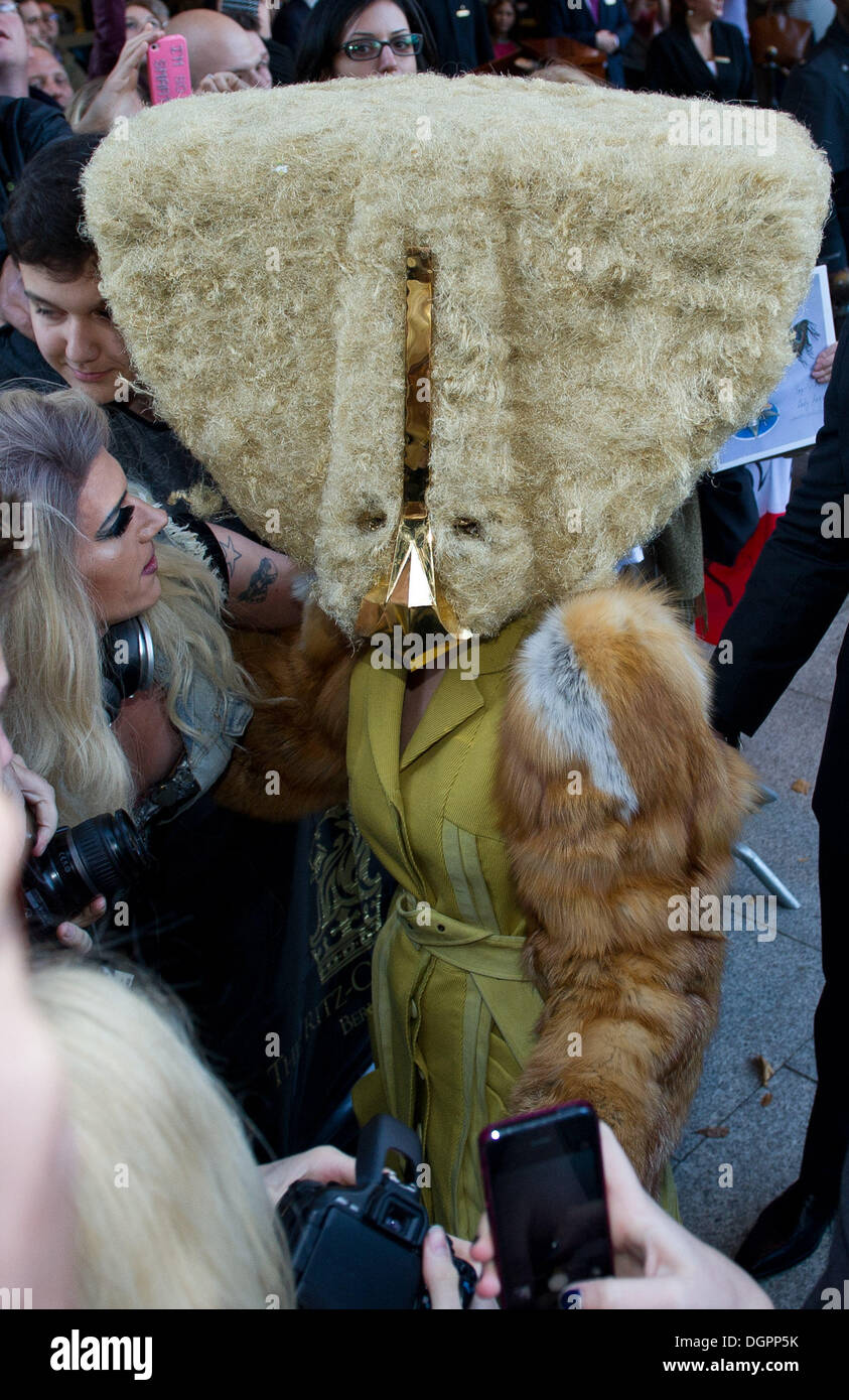 Berlin, Germany. 24th Oct, 2013. Singer Lady Gaga wears an ...