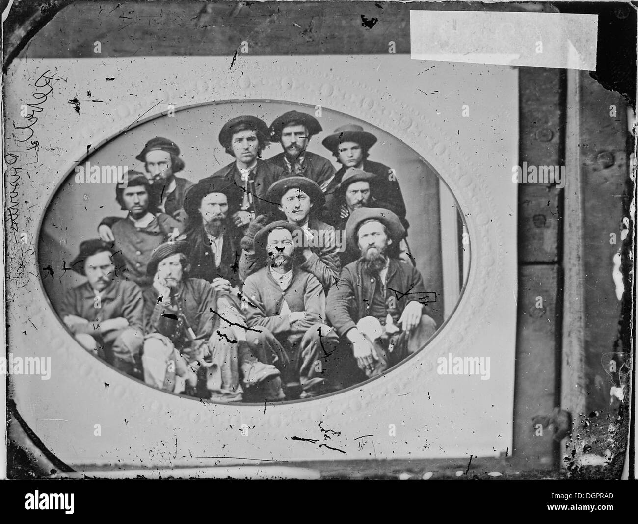 This photograph captures a group of Confederate prisoners, likely taken ...