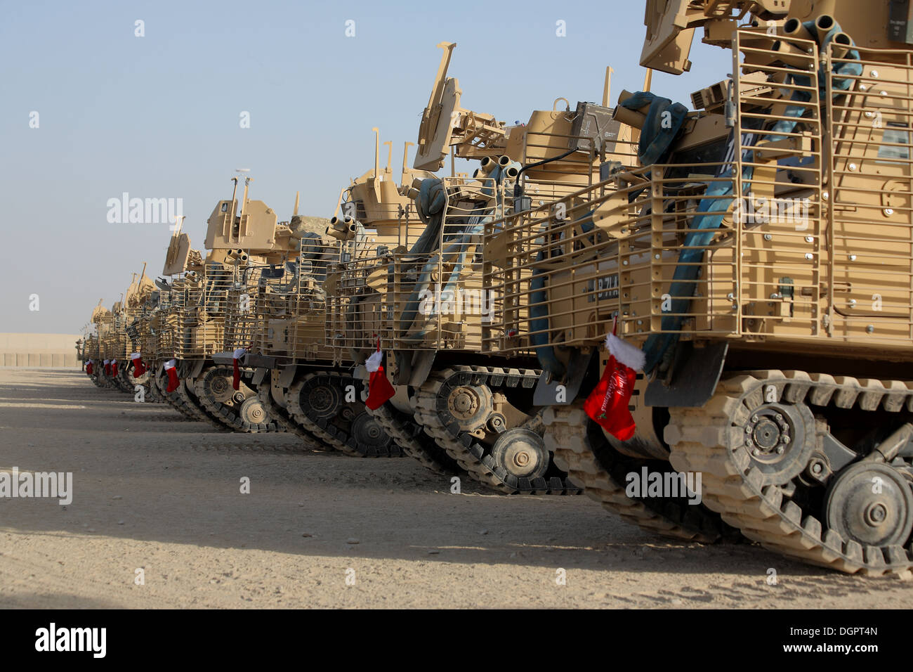 A number of British Army tracked armoured vehicles lined up in ...