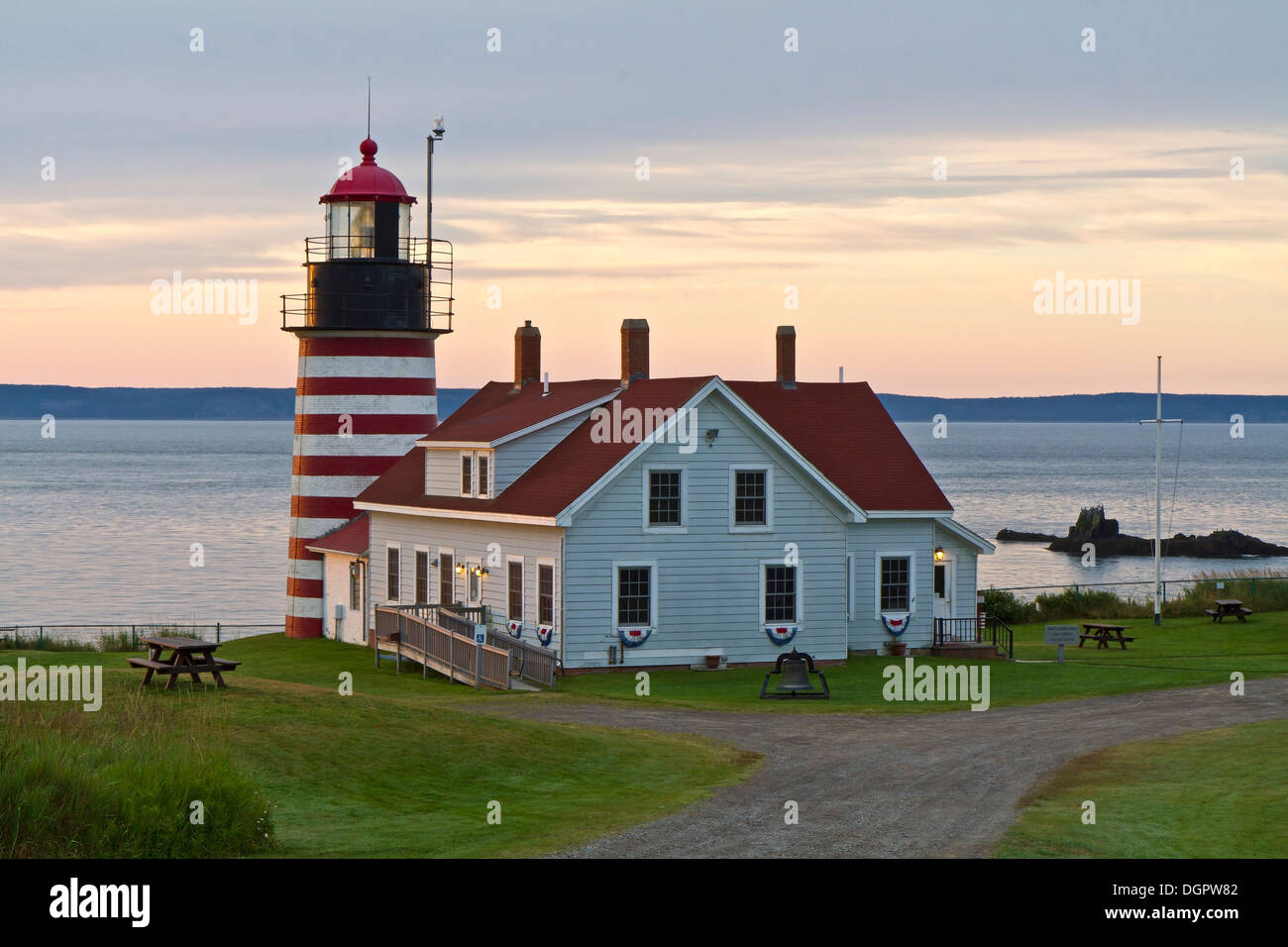 First morning sun on West Quoddy Head Lighthouse, the Easternmost point ...