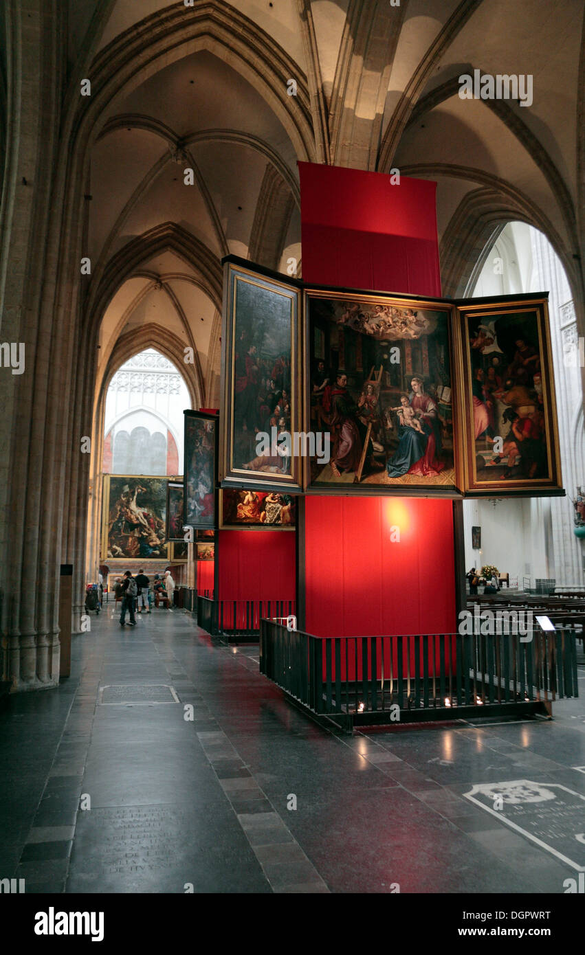 A line of altarpiece triptych paintings in the Cathedral of Our Lady ...