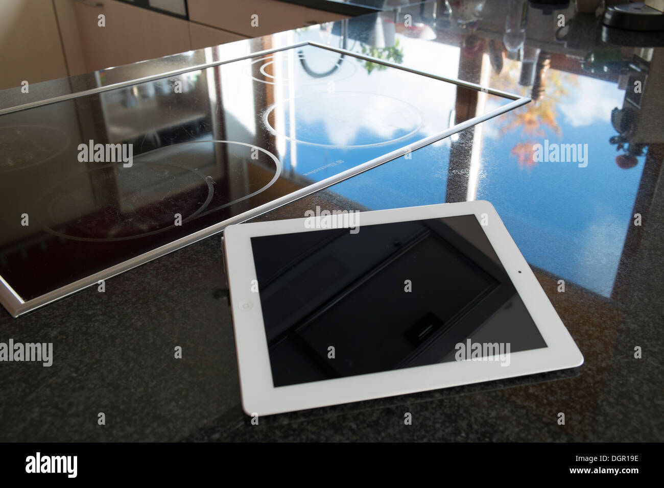 Tablet on the kitchen counter 2 Stock Photo - Alamy