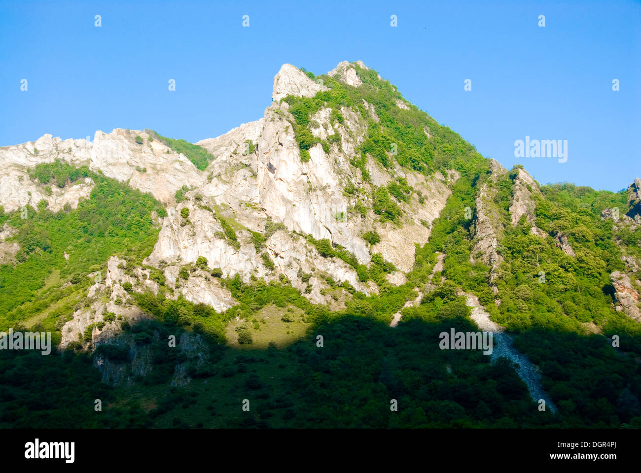 Mountain range in shadow peaks hi-res stock photography and images - Alamy