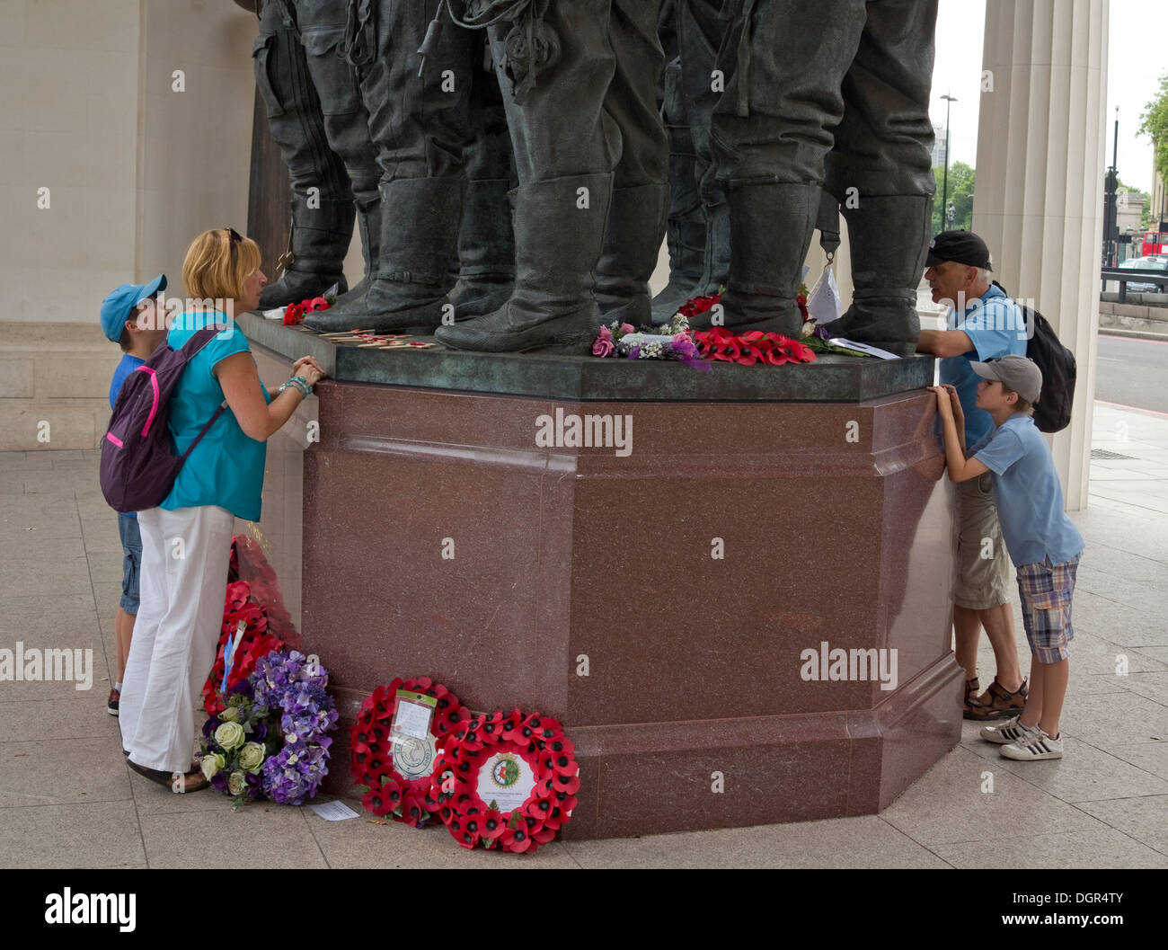 A young family visiting the Bomber Command Memorial in Green Park ...