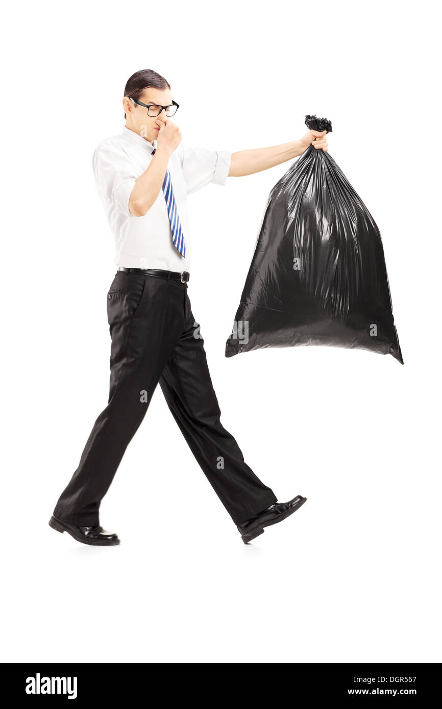 Man is carrying the garbage bag hi-res stock photography and images - Alamy