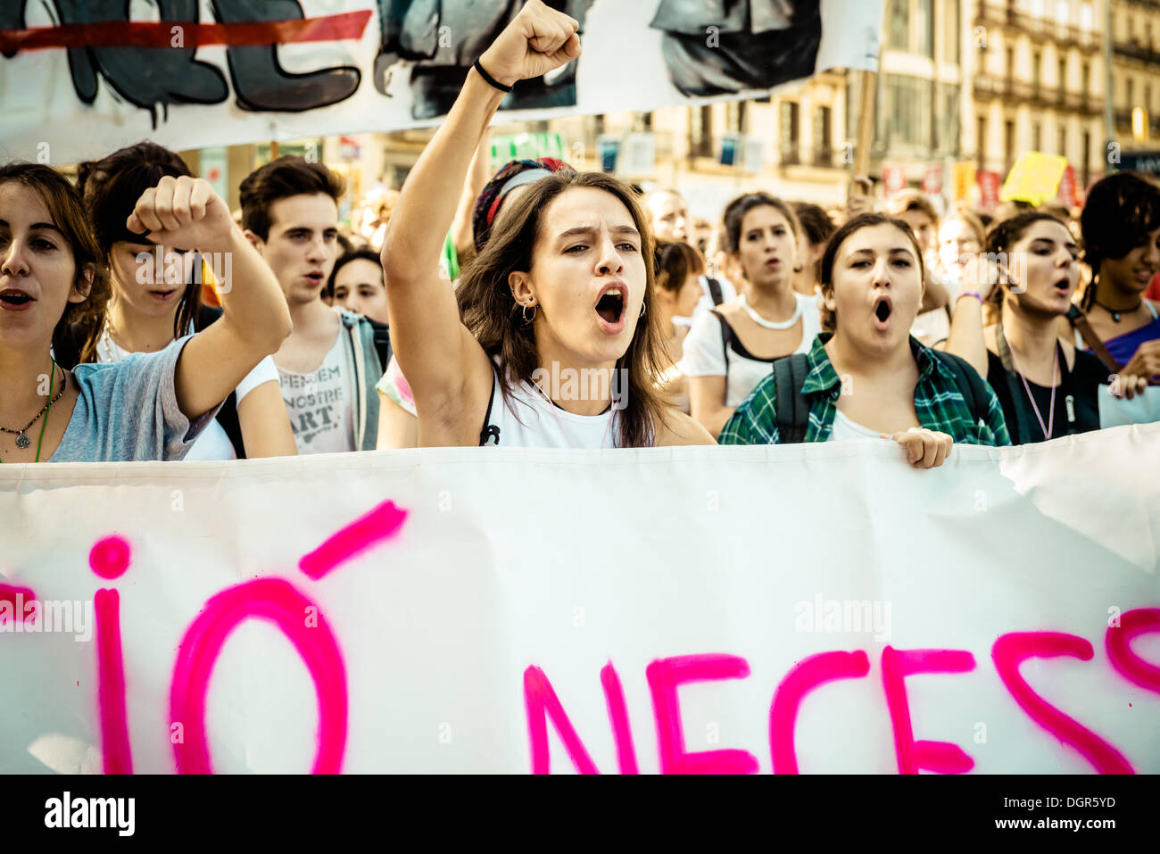 Barcelona, Spain. October 24th, 2013: Protestors shout slogans behind ...