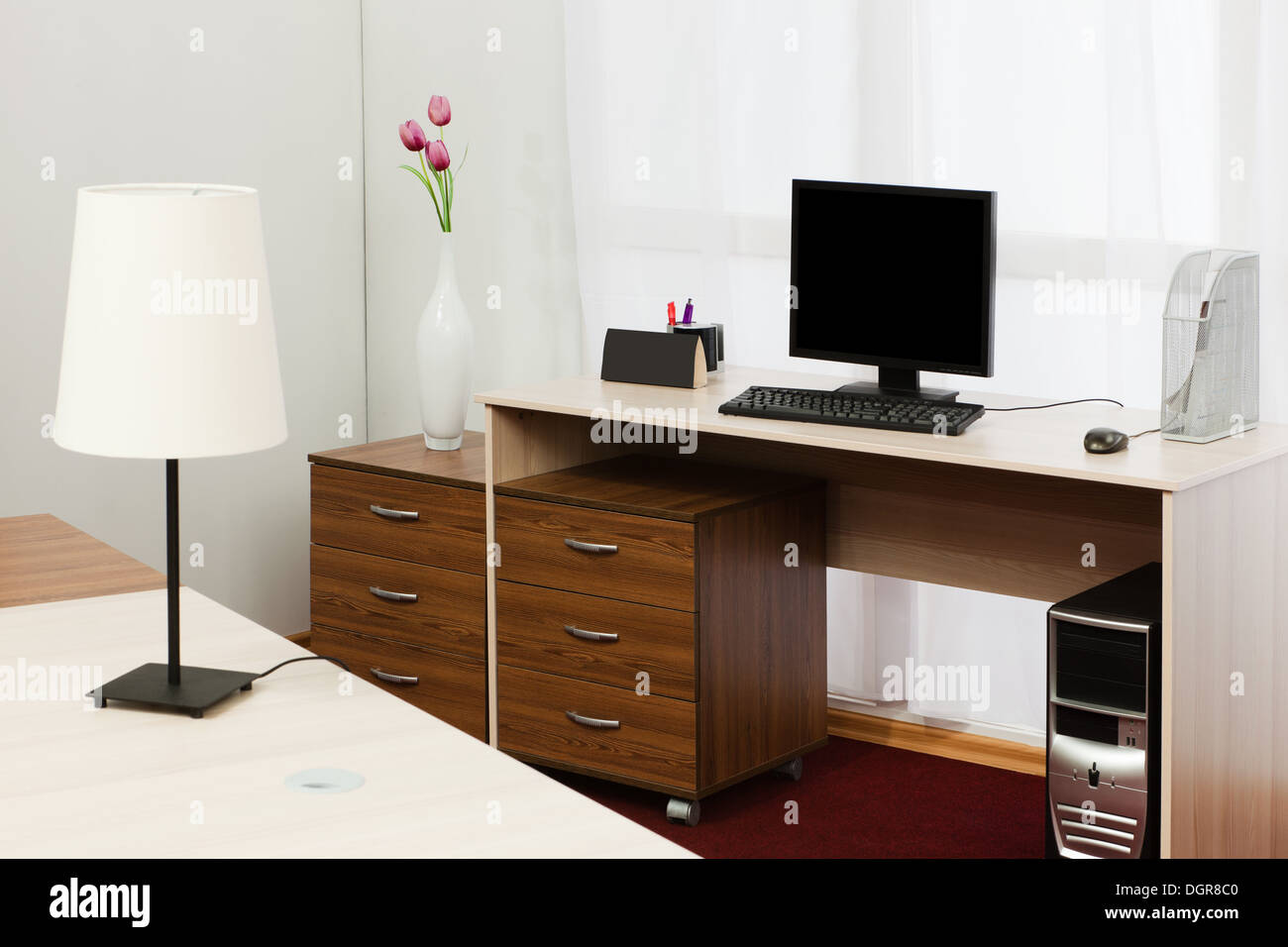 computer on a desk Stock Photo - Alamy