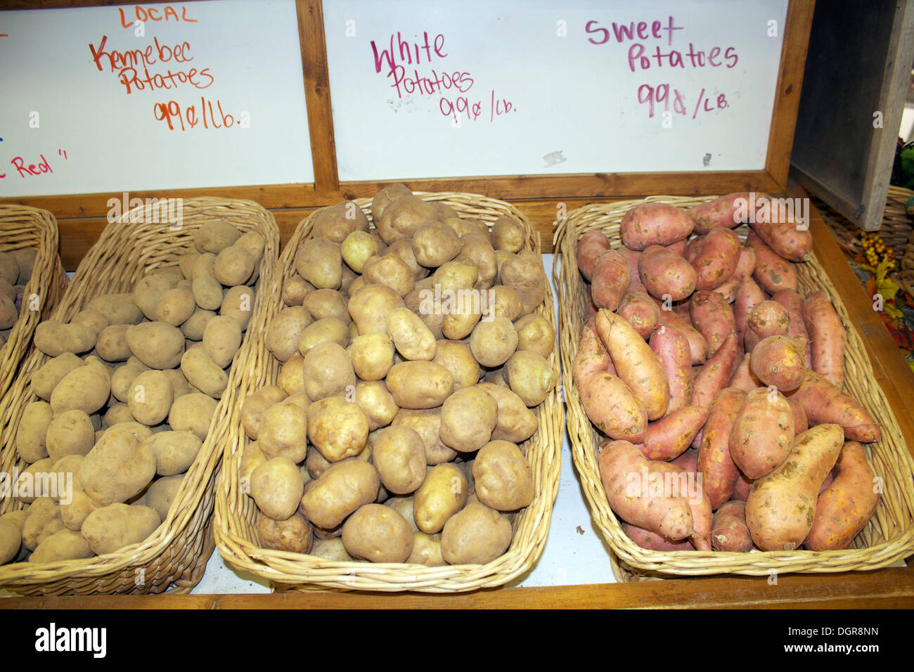 A display of various varieties of potatoes for sale at market Stock ...