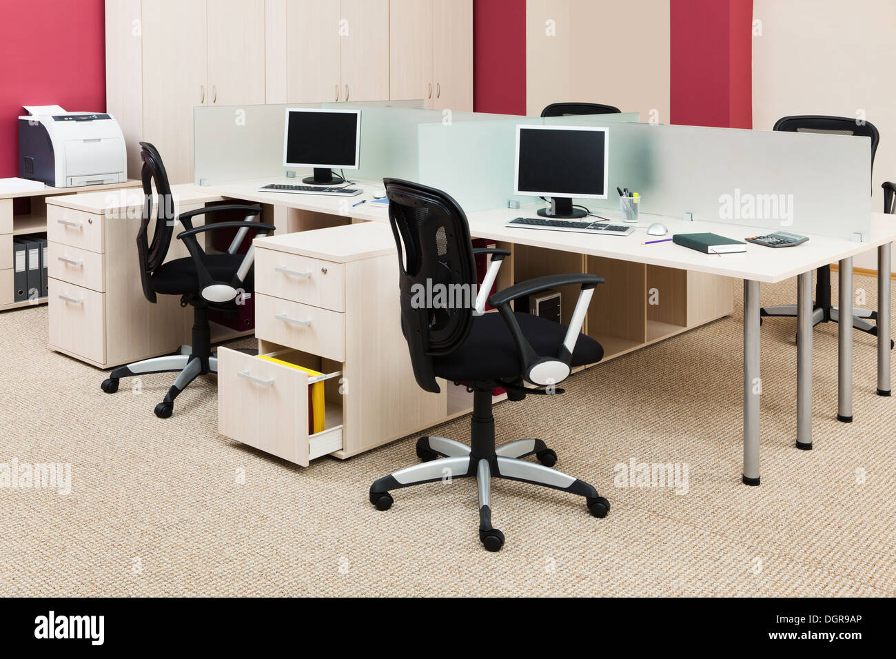 computers on a desk Stock Photo - Alamy