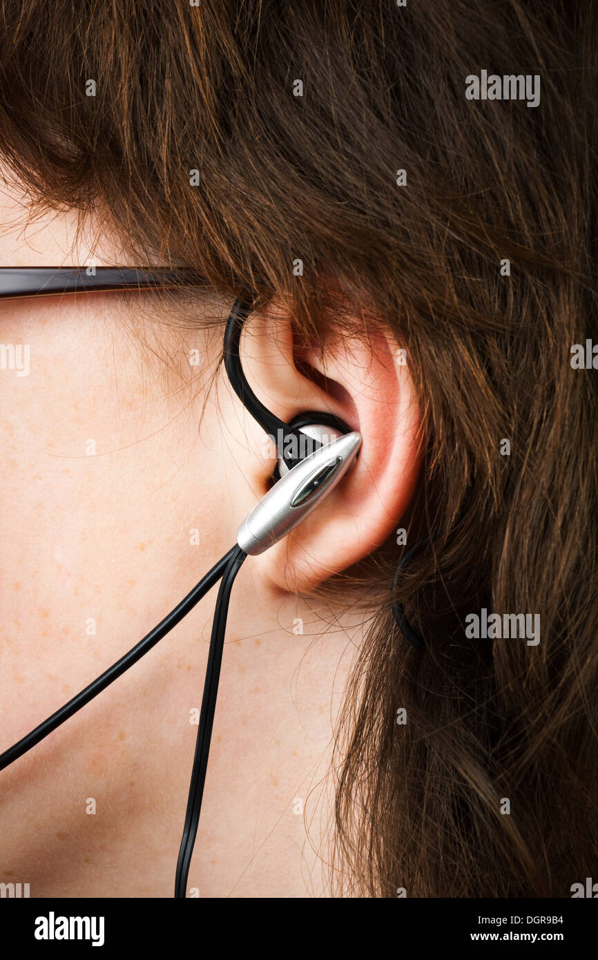 earphone in ear Stock Photo - Alamy