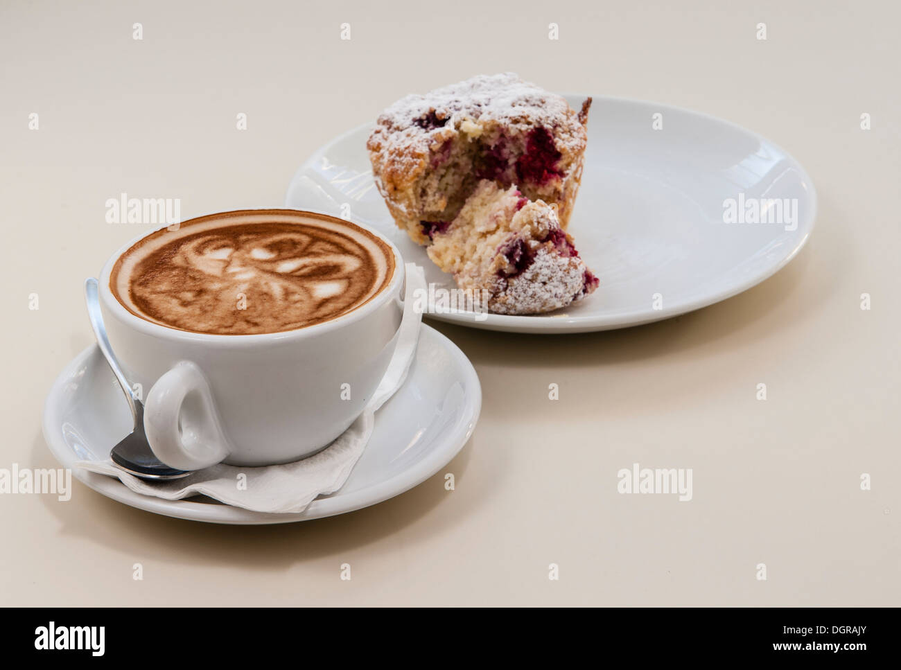 Coffee and muffin served in a cafe, New Zealand Stock Photo - Alamy