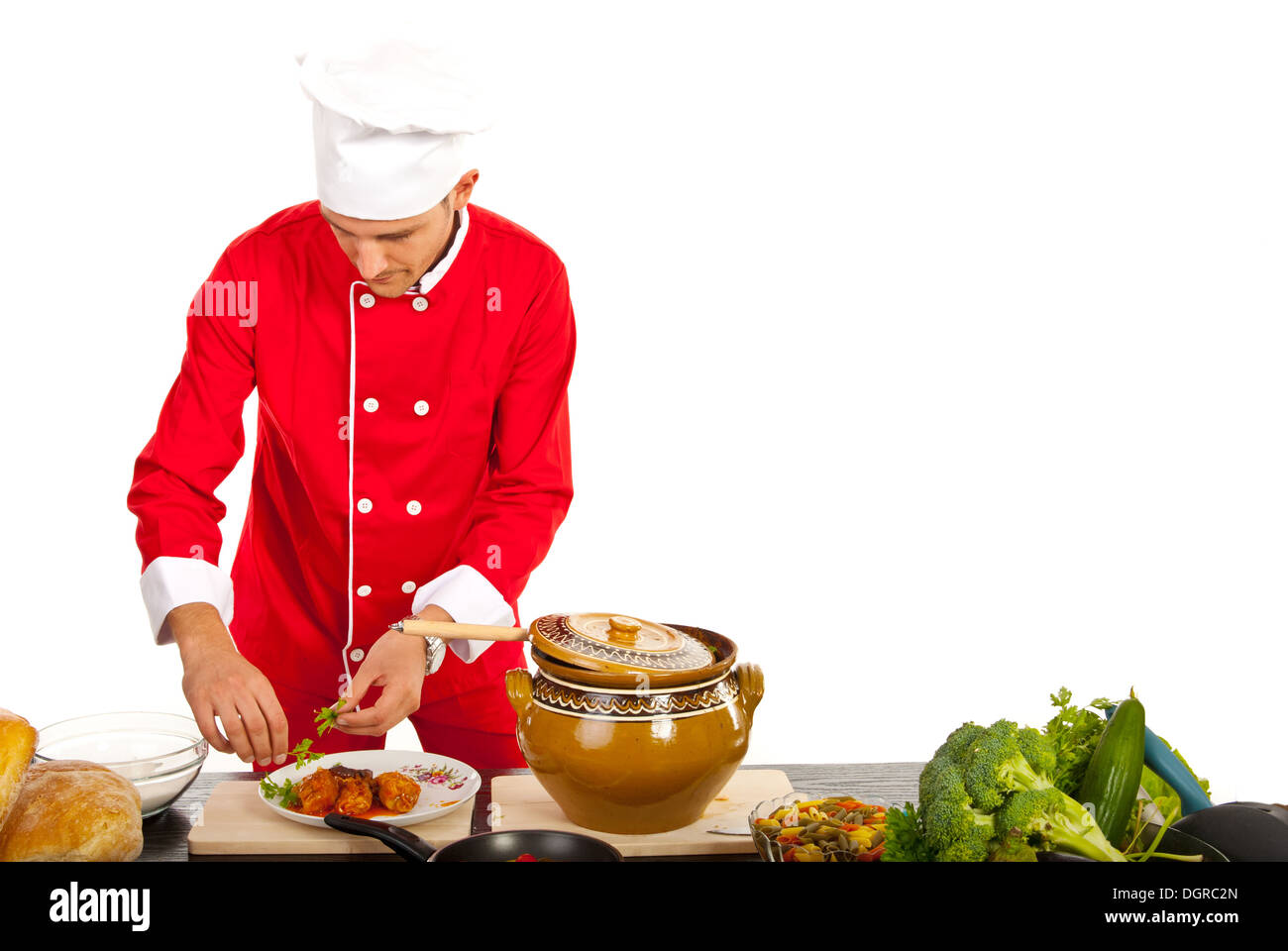 Chef male garnish food on plate against white background Stock Photo ...