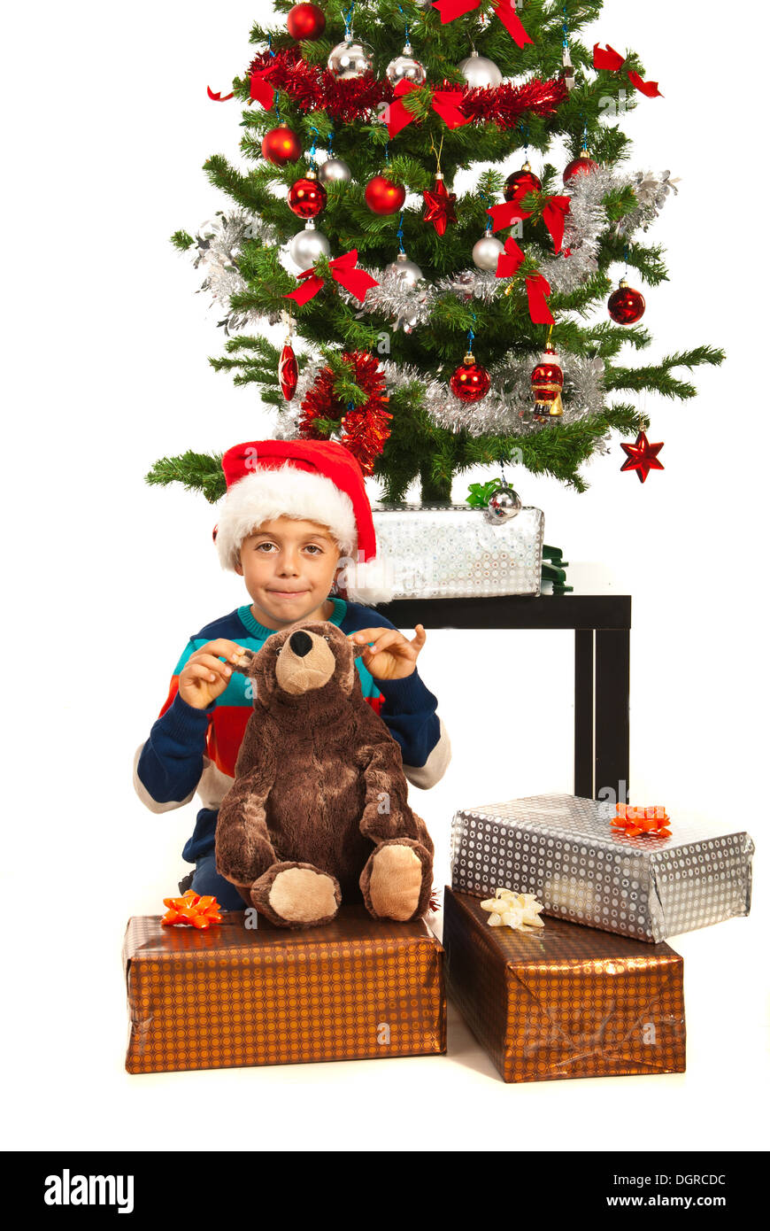 Schoolboy sitting near tree hi-res stock photography and images - Alamy