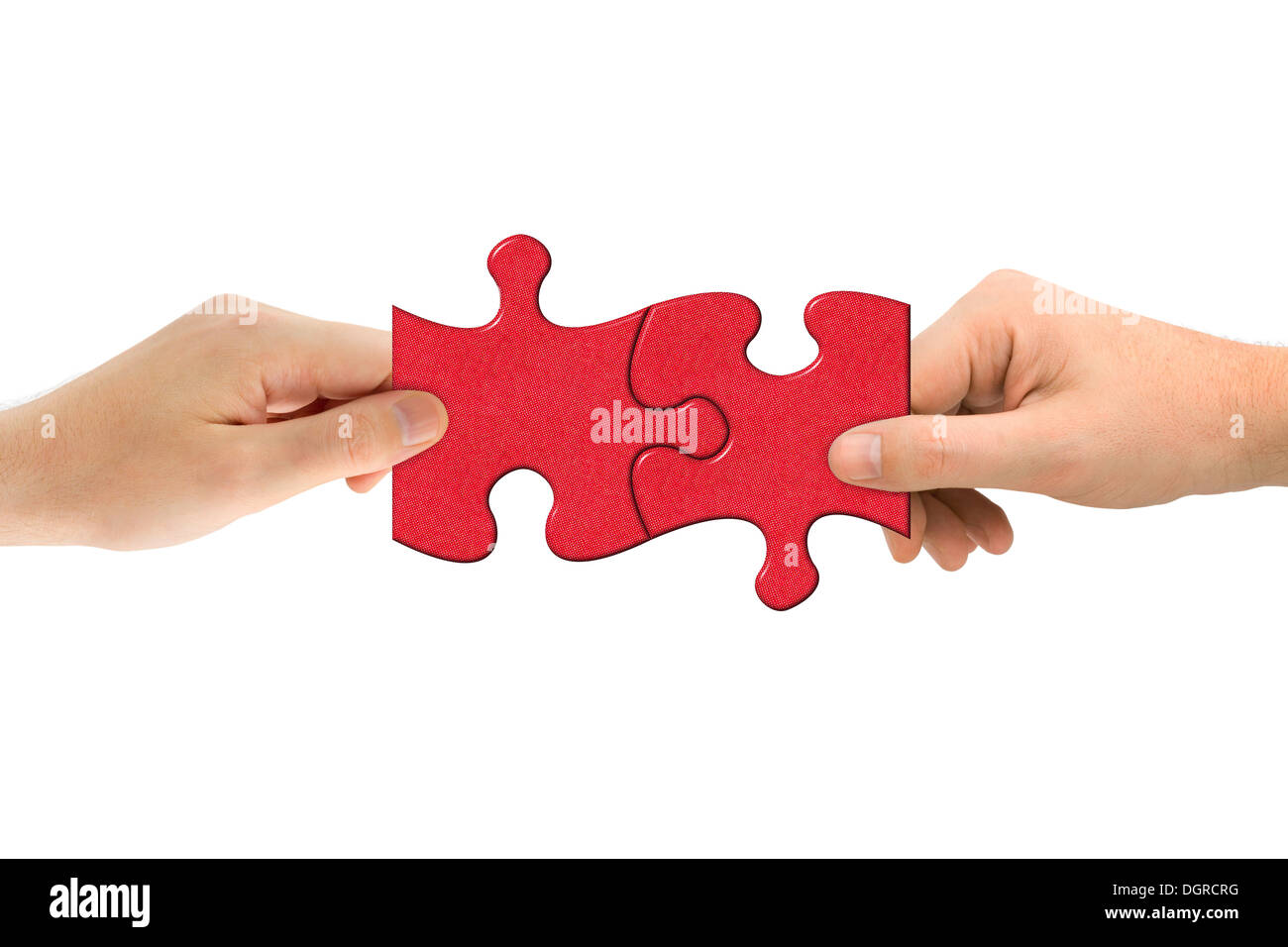 Hands and puzzle Stock Photo - Alamy