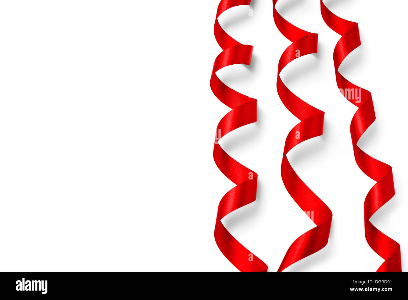 Shiny red satin ribbon on white background Stock Photo - Alamy