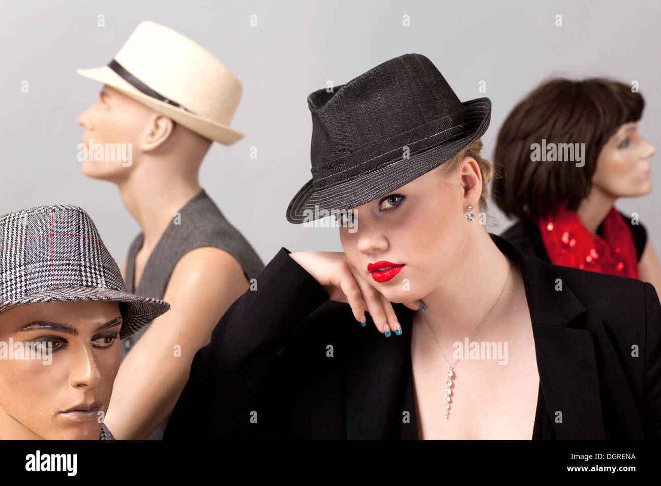 Young woman with dummies Stock Photo - Alamy
