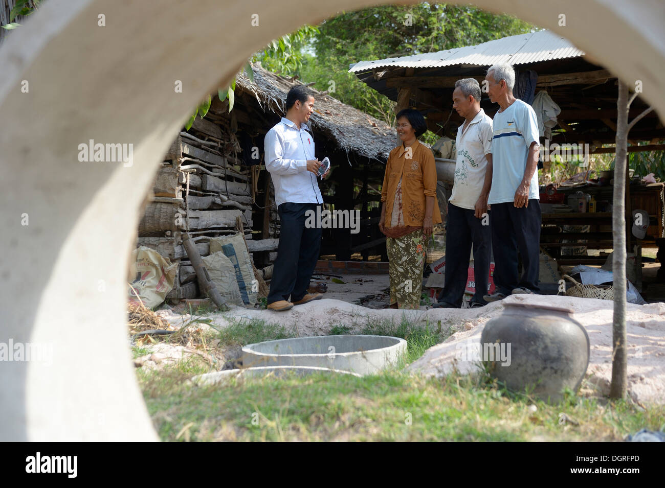 Cambodia, Takeo Province, Members of aid organisation discussing ...