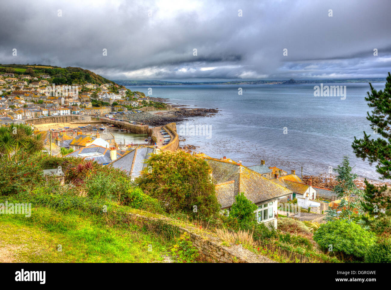 View of Mousehole fishing village and harbour Cornwall England UK ...