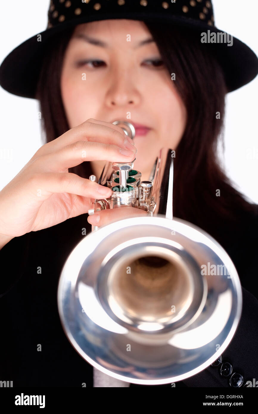 Female playing trumpet hi-res stock photography and images - Alamy