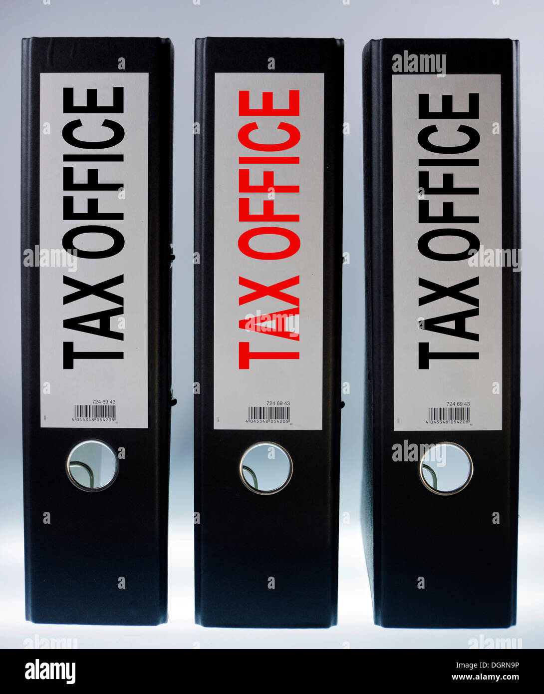 Three file folders labeled "tax office Stock Photo - Alamy