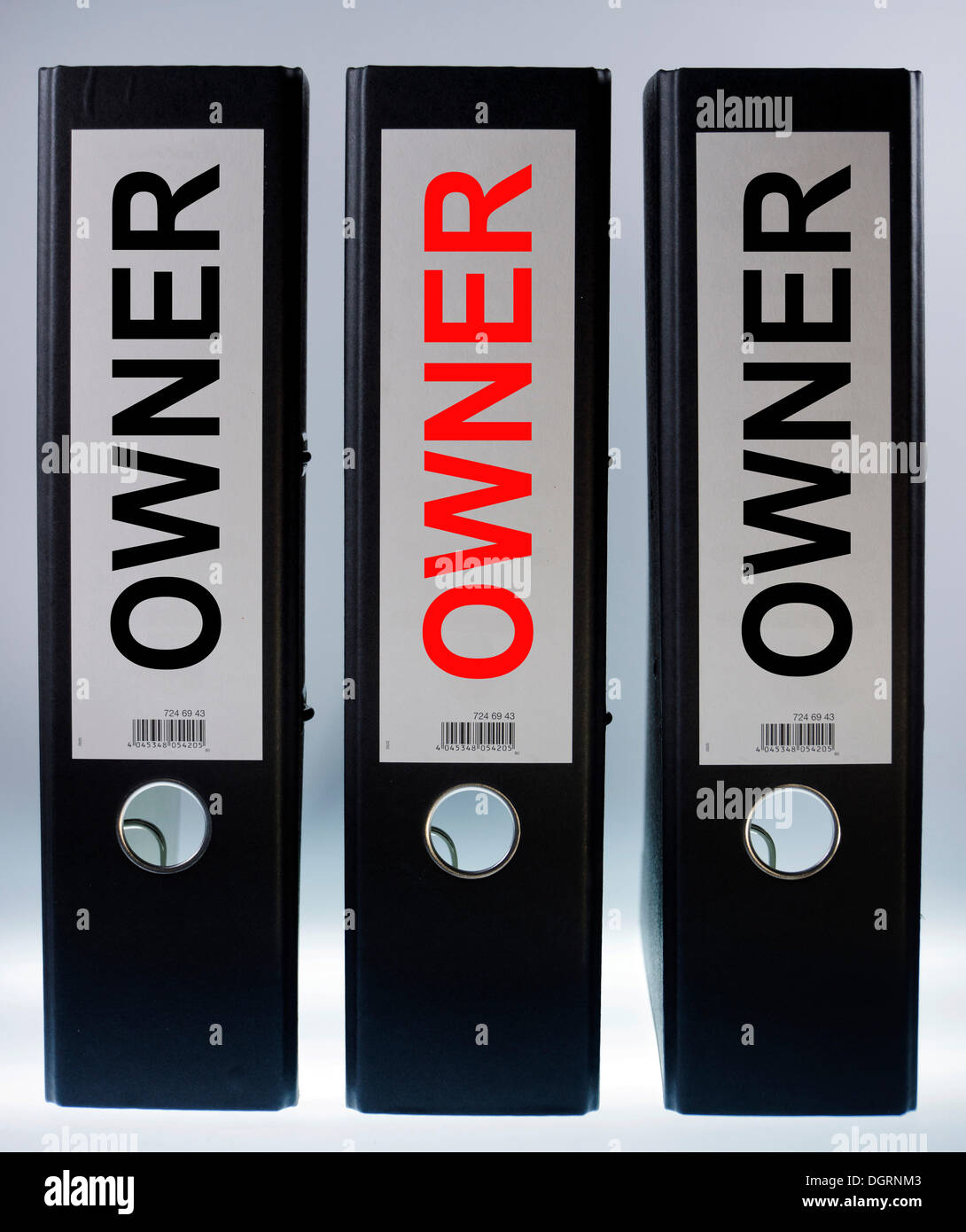 Three file folders labeled "Owner Stock Photo - Alamy