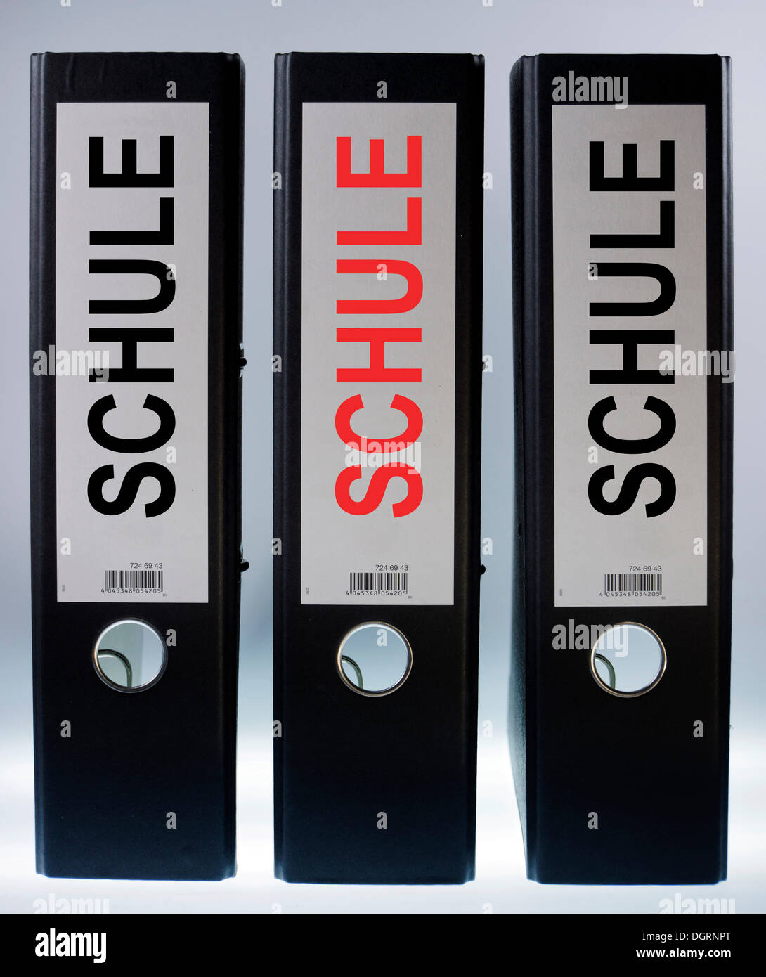 Three file folders labeled "Schule", German for "school Stock Photo - Alamy