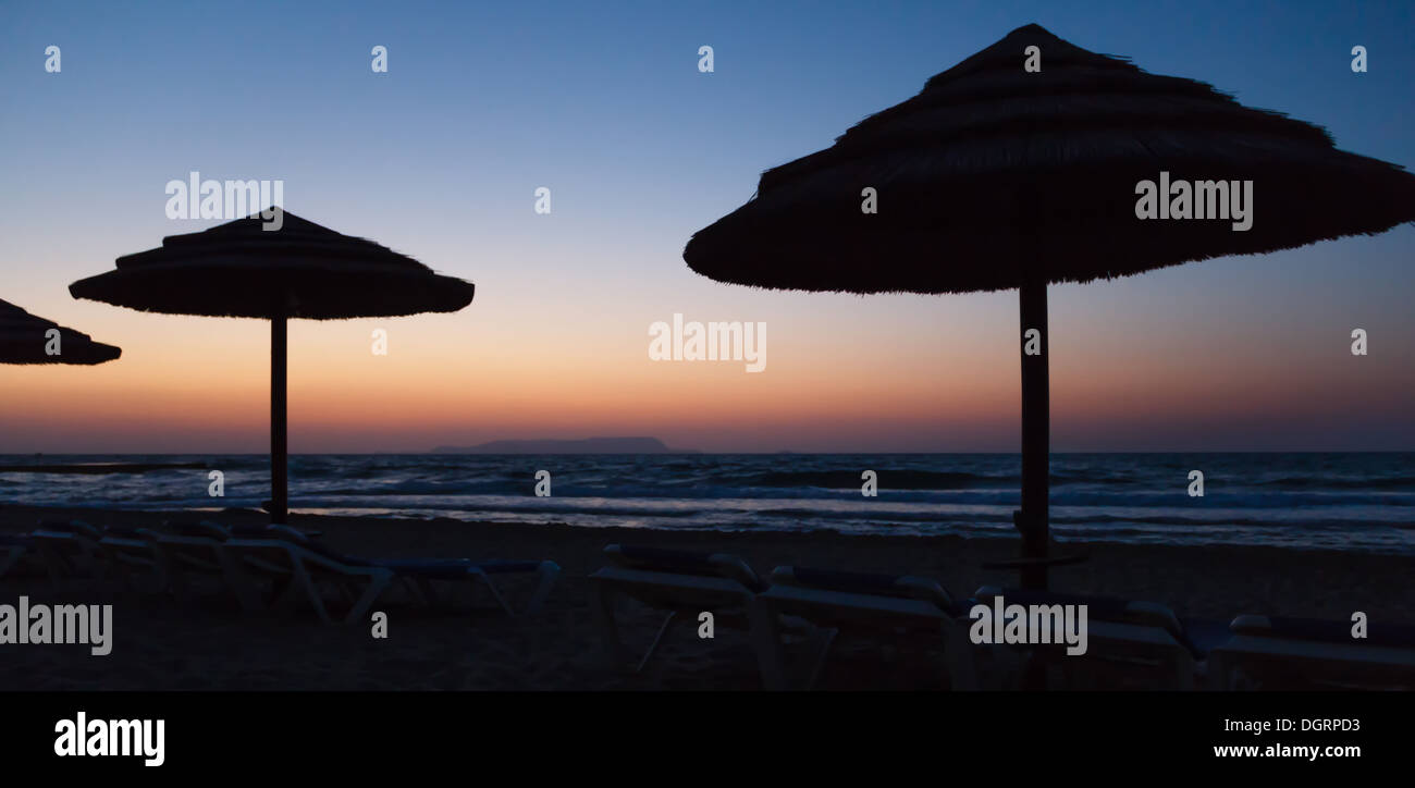 sunset on beach of the island of Crete Stock Photo - Alamy