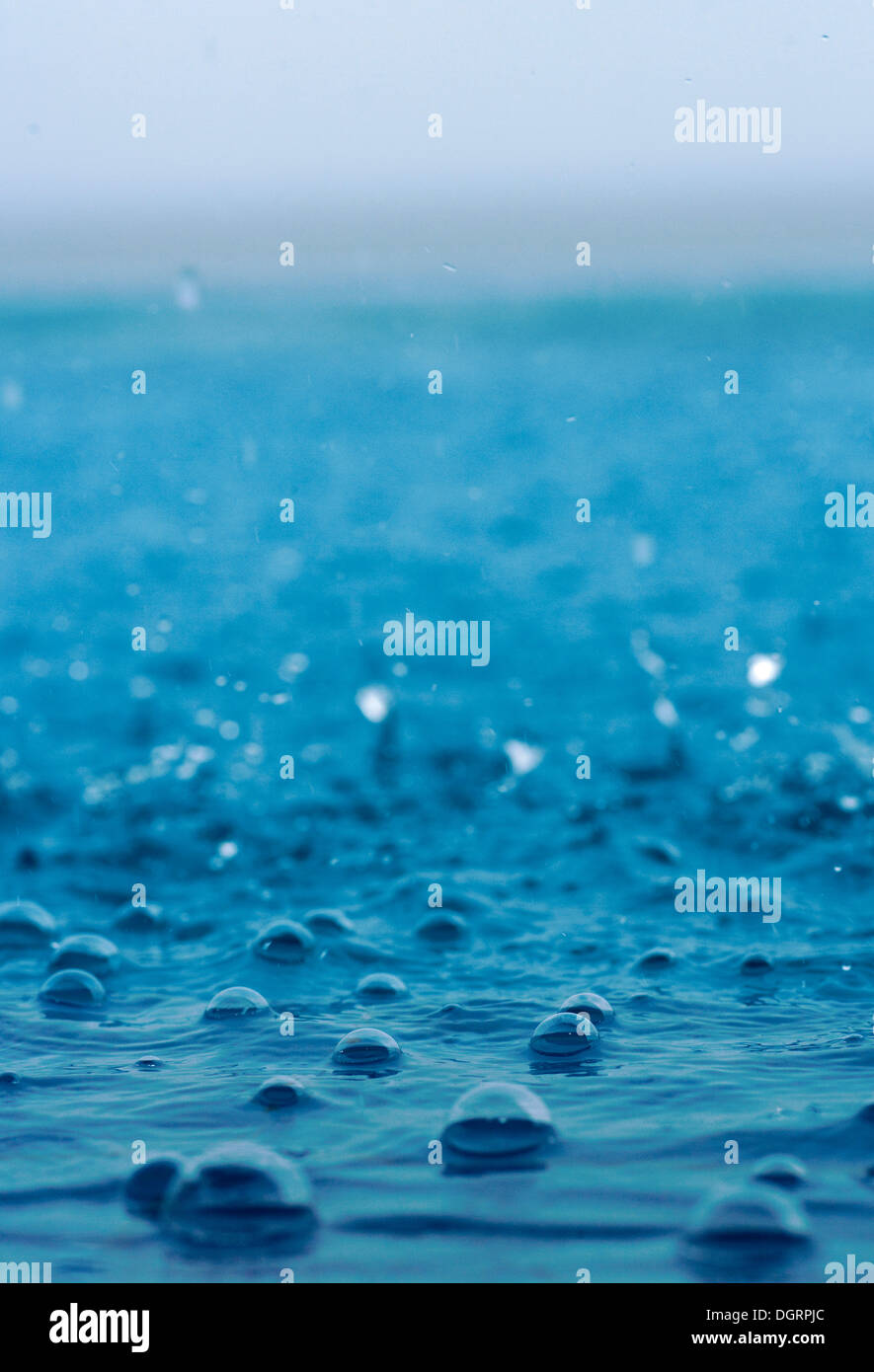 Raindrops falling into the sea, Indonesia Stock Photo - Alamy