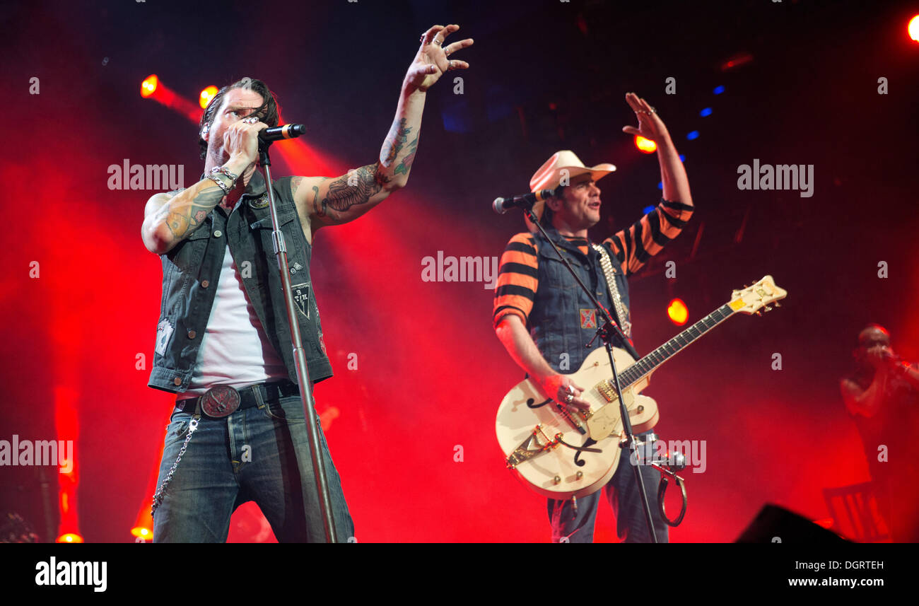 Berlin, Germany. 24th Oct, 2013. Sascha Vollmer aka Hoss Power (R) and ...