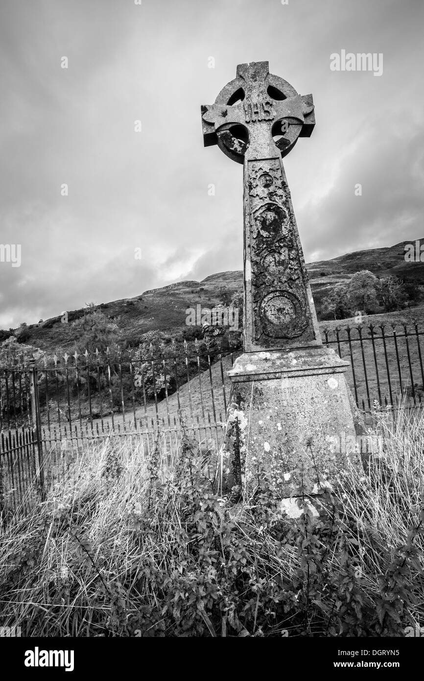 IHS Christogram on Celtic cross against sky Stock Photo - Alamy