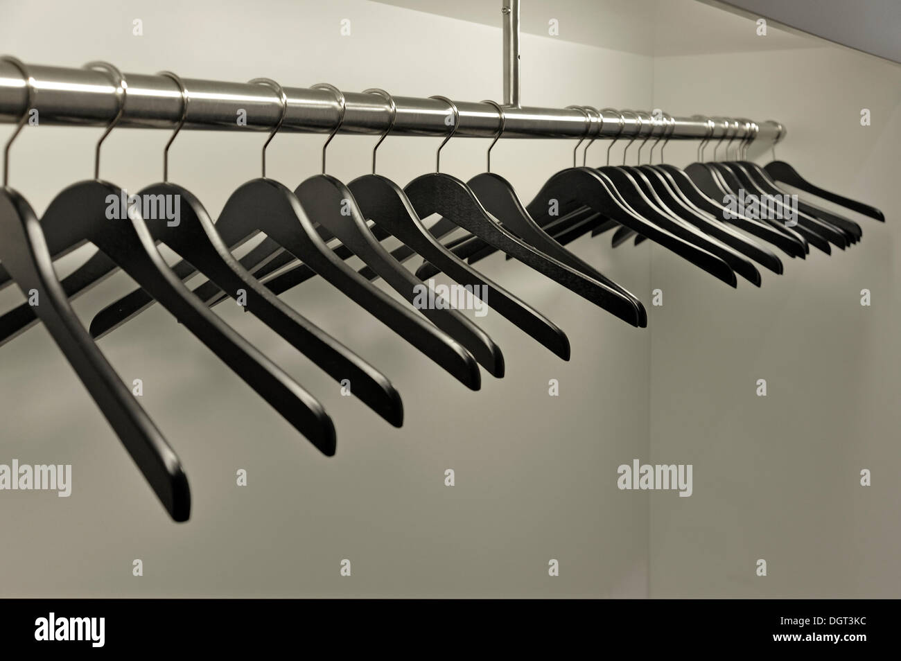 Coat hangers on an empty coat rack, Baden-Baden, Baden-Wuerttemberg ...