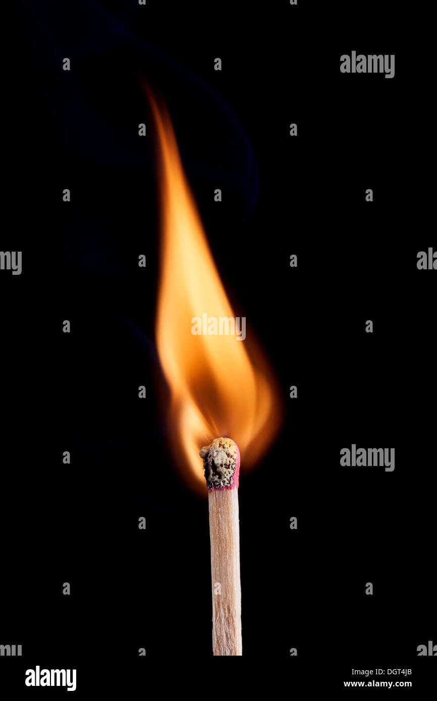 Ignition of a match, with smoke on dark background Stock Photo - Alamy