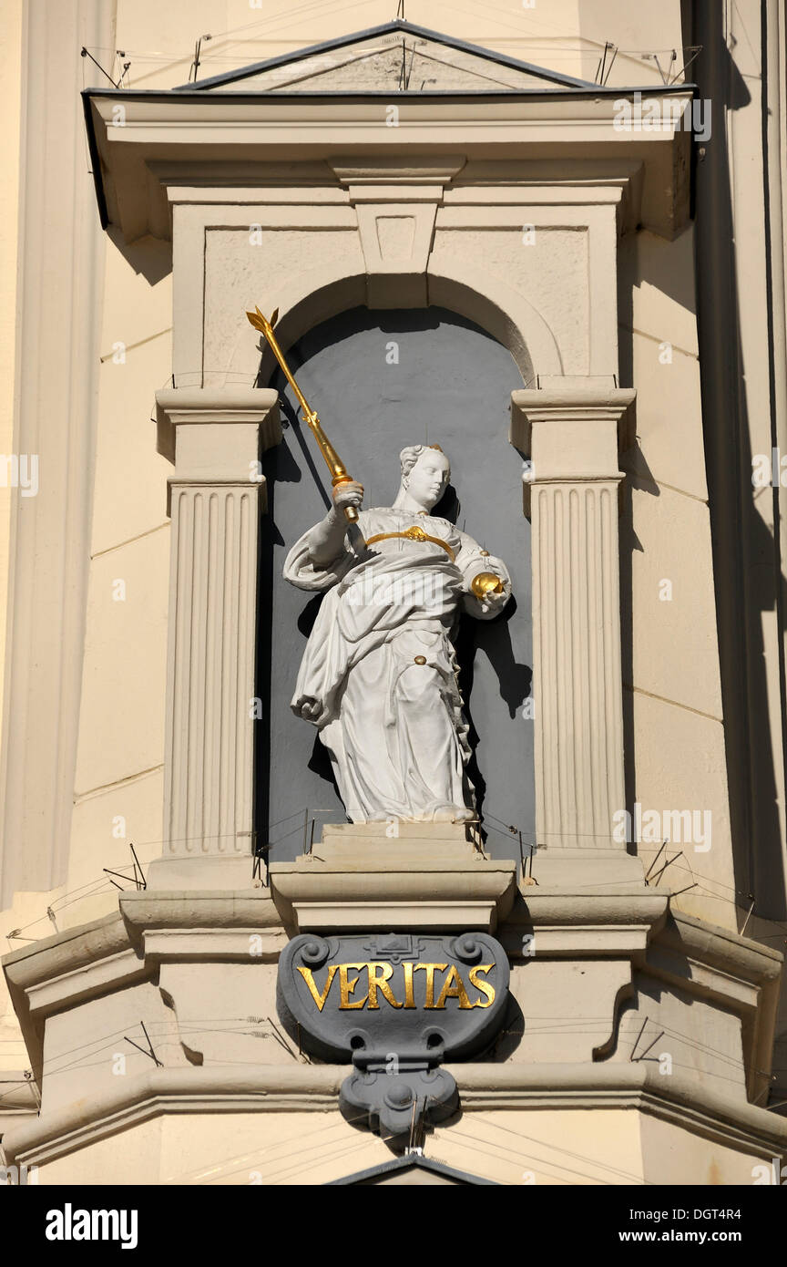 Statue of Veritas, the goddess of truth, on the baroque facade of the ...