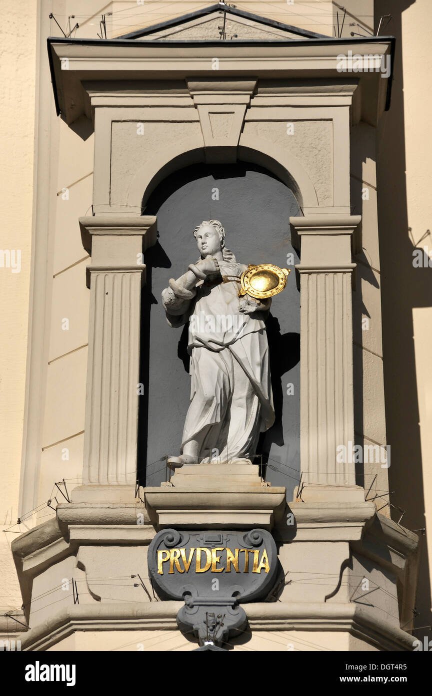 Statue of Prudentia, the goddess of wisdom, on the baroque facade of ...