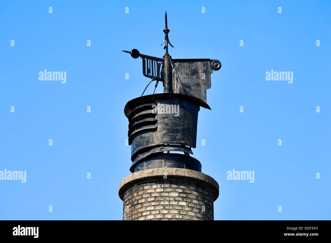 Chimney of a former brewery from 1907 against a blue sky, Brand, Middle ...
