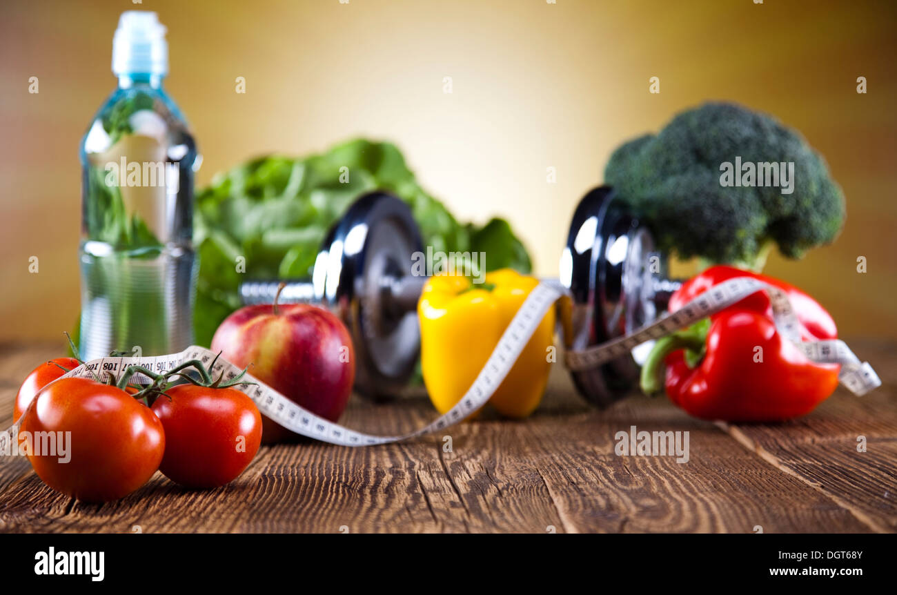 Dumbbell, fresh food and measure tape Stock Photo - Alamy