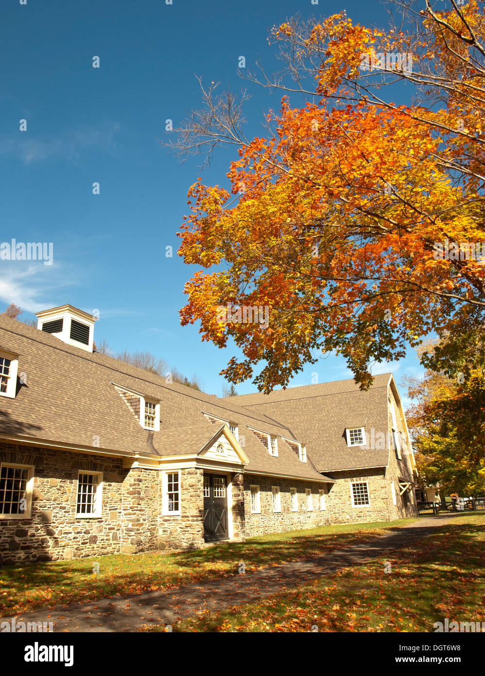 horse stables in autumn vertical Stock Photo - Alamy