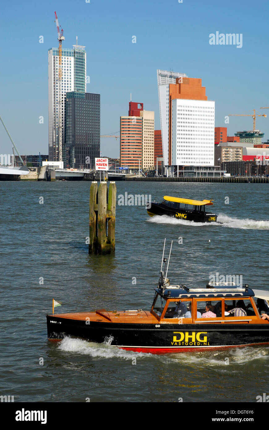 Small watertaxi ferry boats on the Nieuwe Maas River, modern ...