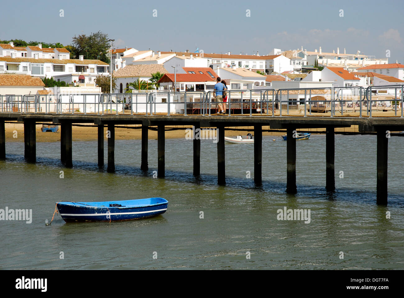 Boat and jetty at the Rio Piedras river, beach in El Rompido, Cartaya ...