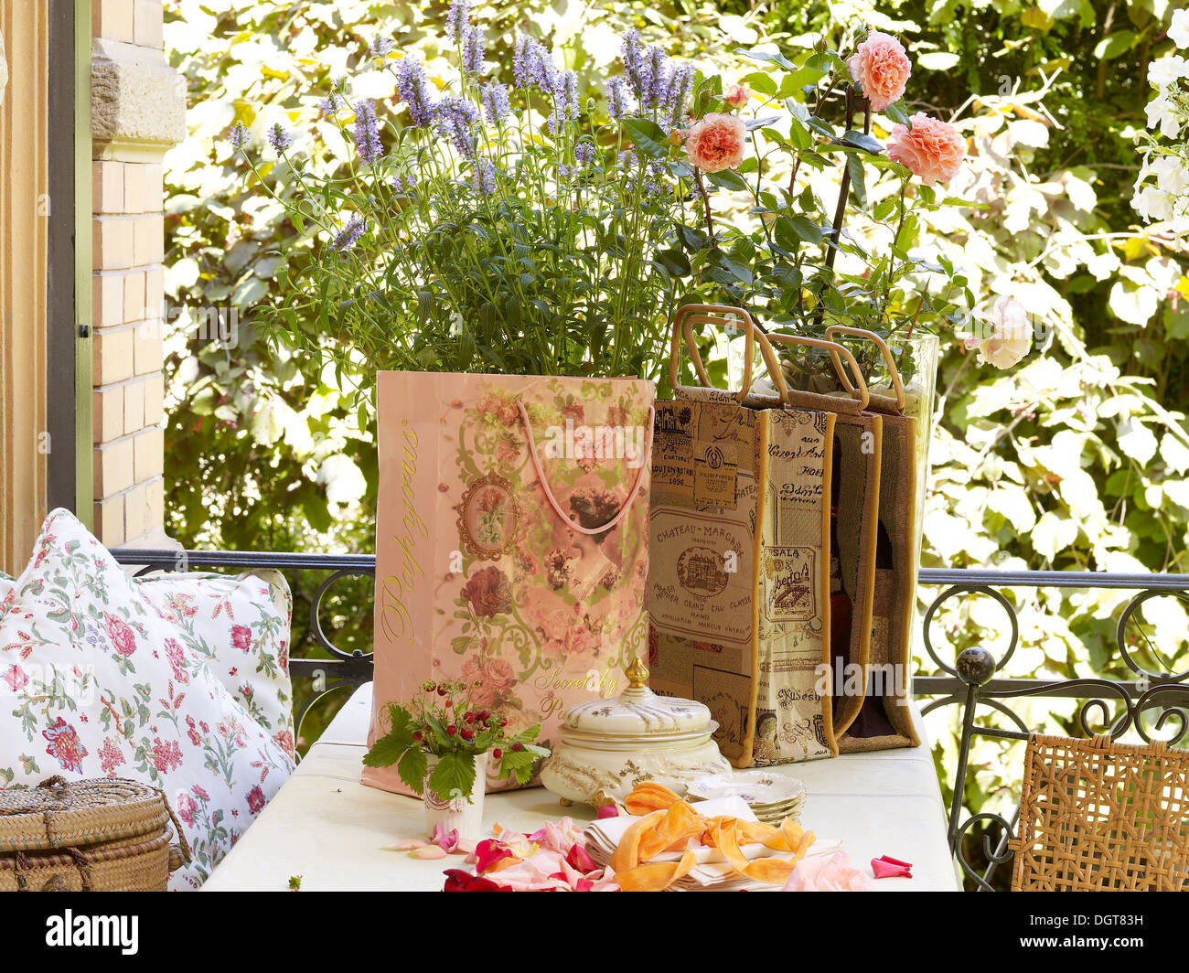 decorative balcony with flowers and painted paper bags Stock Photo - Alamy