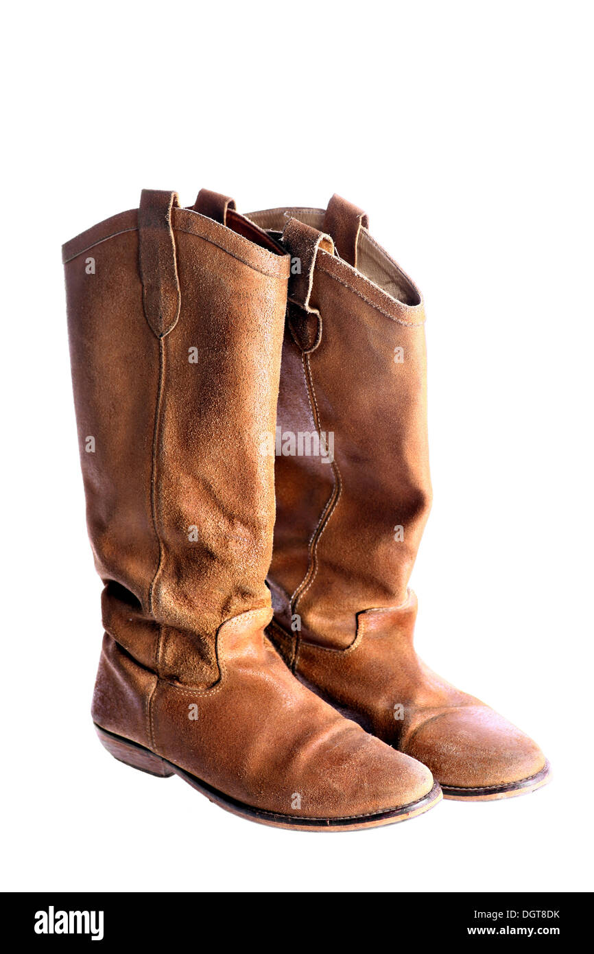 A studio shot of a pair of worn brown leather boots Stock Photo - Alamy