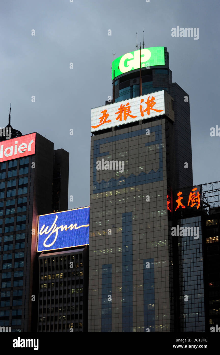 Skyscrapers and neon signs at dusk, Wan Chai, Hong Kong Island, Hong ...